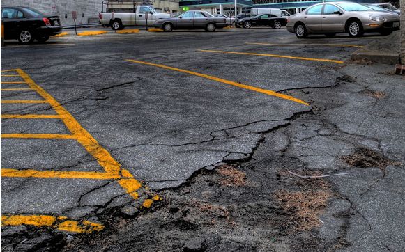 Typical Problems of a Badly Paved Parking Lot by Arnold Asphalt in ...