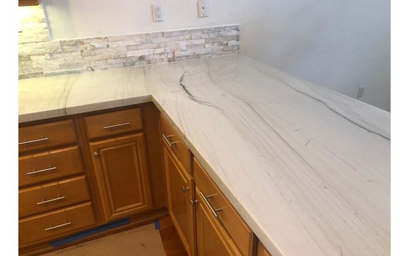 Zermatt Quartzite kitchen counters with stack stone splash. by Central ...