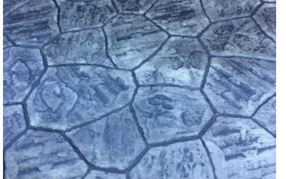 Random stone stamped concrete patio by Rockhard Concrete and ...