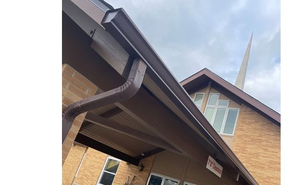 Soffit, facia, seamless gutters and downspouts. Standing seam metal ...