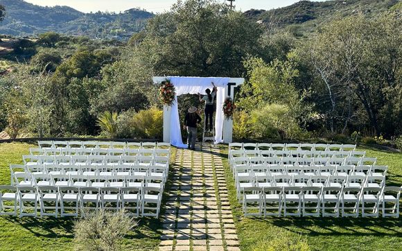White folded resin chairs by FOMO My Booth : San Diego's Premier Photo ...