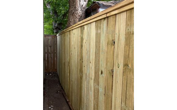 Privacy fence between two commercial buildings. by Cornerstone Fence ...