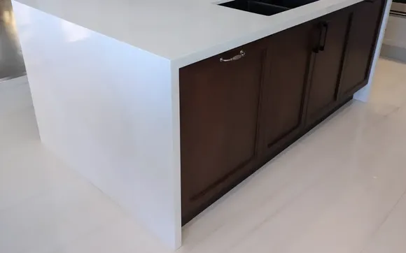 Islands with waterfall returns by Surfaces Design Studio Inc in Caledon, ON - Alignable