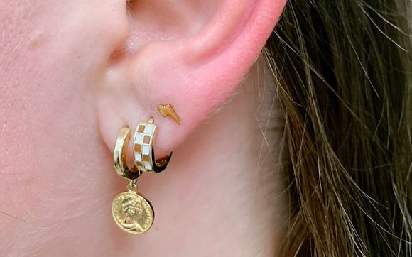 First, second, and third lobe piercings by Monarch Piercing Studio in ...